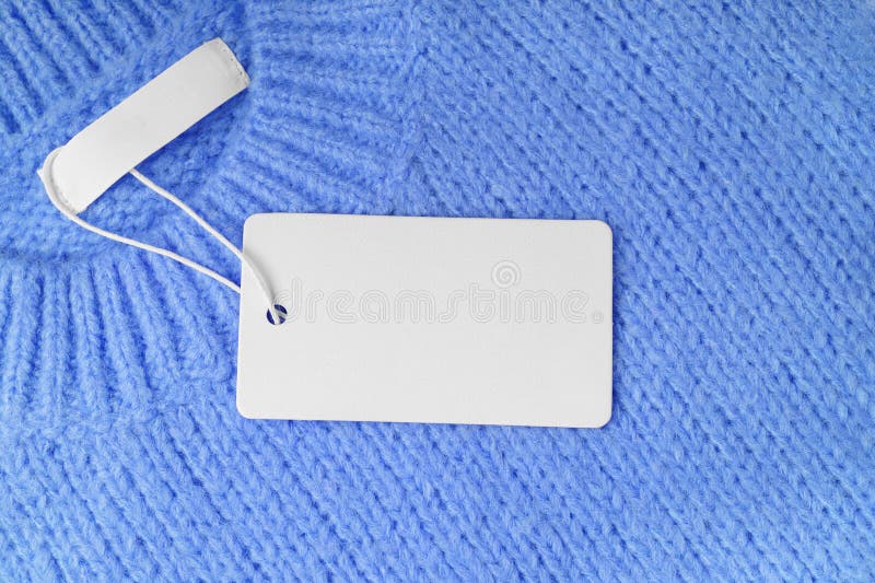 Blank Clothing Tag and Inner Label on Neck of Blue Knitted Sweater ...