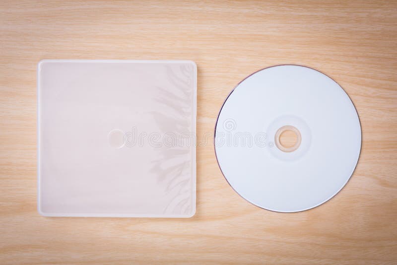 Blank Compact Disc with Cover on Wood Background Stock Photo - Image of ...