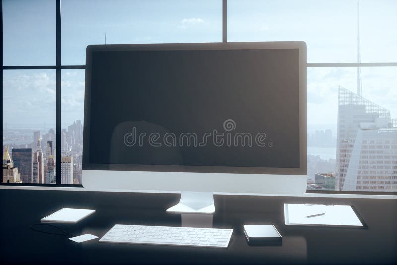 Blank Computer Monitor with Office Accessories on a Table in the Stock ...