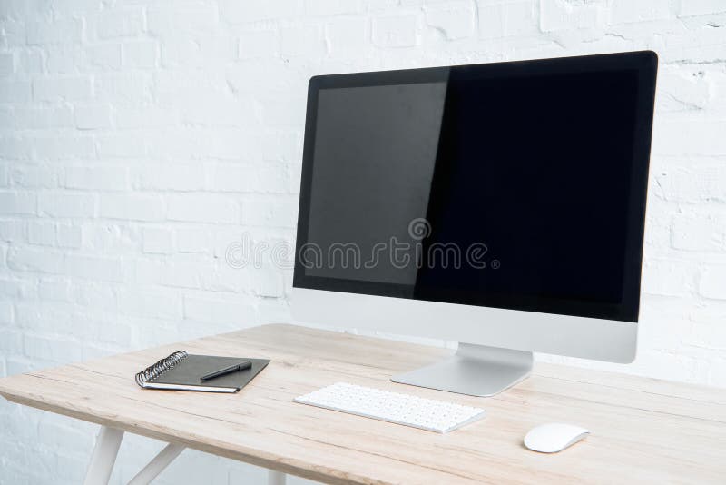 Blank Computer Screen with Notebook on Table Stock Image - Image of ...