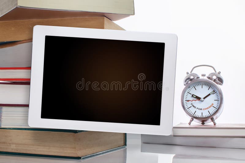 Blank Digital Computer Tablet with Stack of Textbook with Time To ...