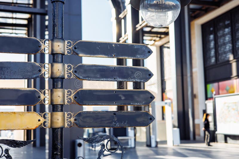 Blank Directional Sign with Decorative Elements in Urban Setting during ...
