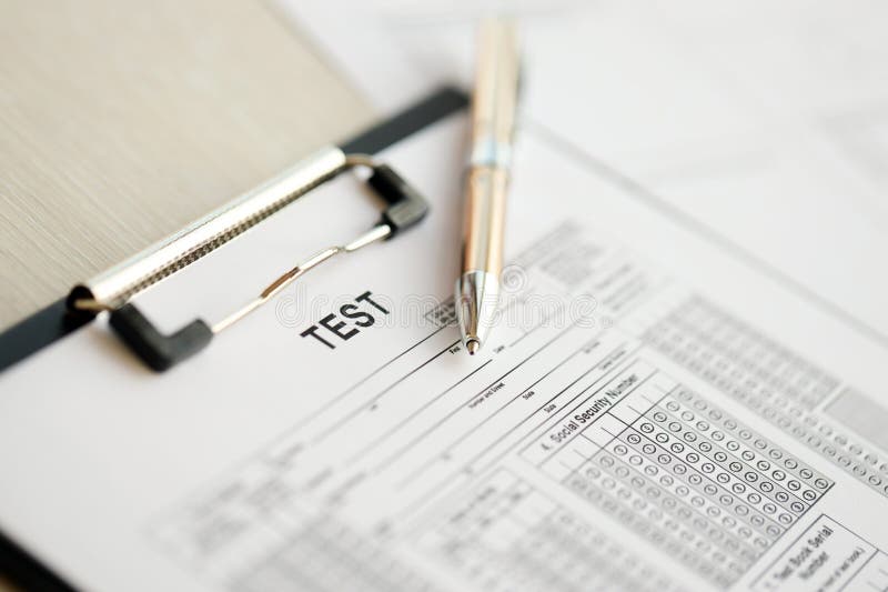 Blank Educational Test for Students Lies on Table in Classroom with Pen ...