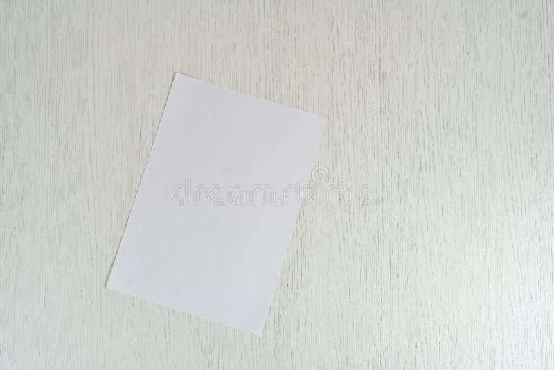 A Blank Empty White Paper Sheet of A4 Format on the Table in Office ...