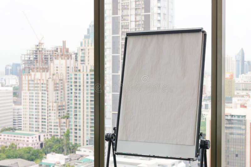 Blank Flip Chart with City View on Background - Business Brainstorm ...