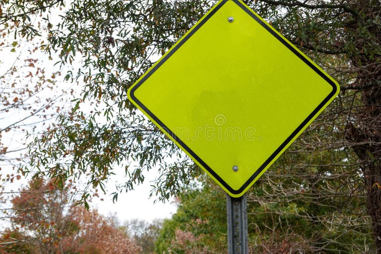 Blank Fluorescent Green Triangular Yield Sign with Trees in the ...
