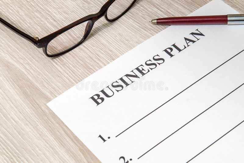 Blank Form and Pen for Drawing Up Business Plan on Table Stock Photo ...