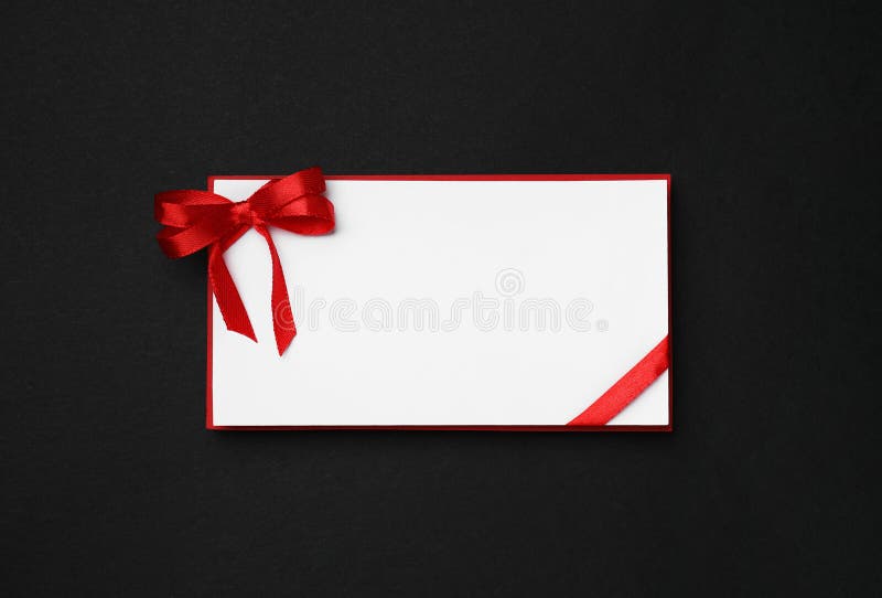 Blank Gift Card with Red Bow on Black Background, Top View Stock Photo ...