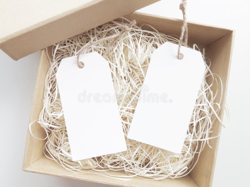 2 Blank Gift Tag on a Kraft Box Mockup. Stock Photo - Image of brown ...