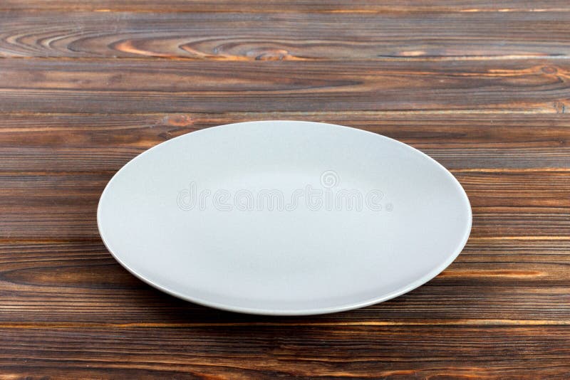 Blank Gray Empty Round Plate on a Wood Background Stock Image - Image ...