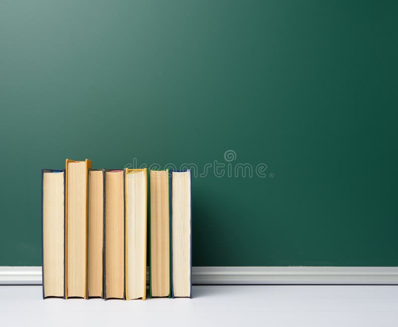 Blank Green Chalk School Board and Stack of Books Stock Image - Image ...