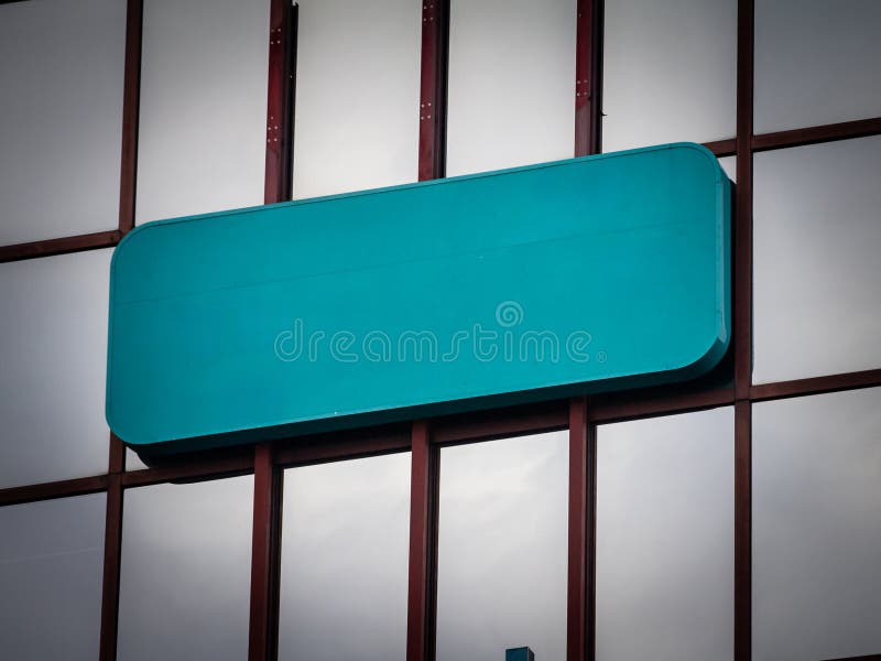 A Blank Green Rectangular Sign Mounted on a Business Buildingâ€™s Glass ...