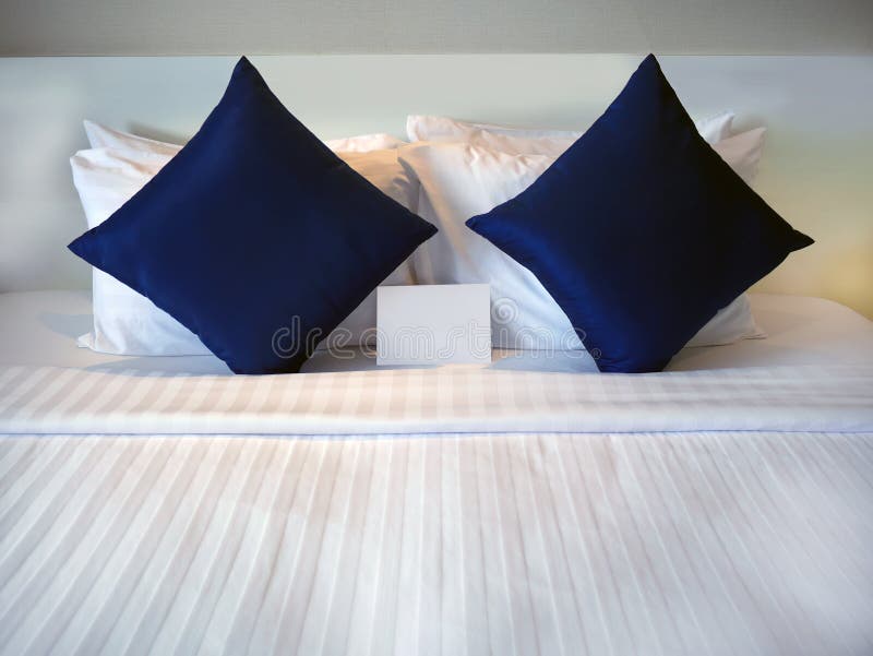 Blank Greetings Card at the Dark Blue Pillow on the Bed with Hotel Turn ...