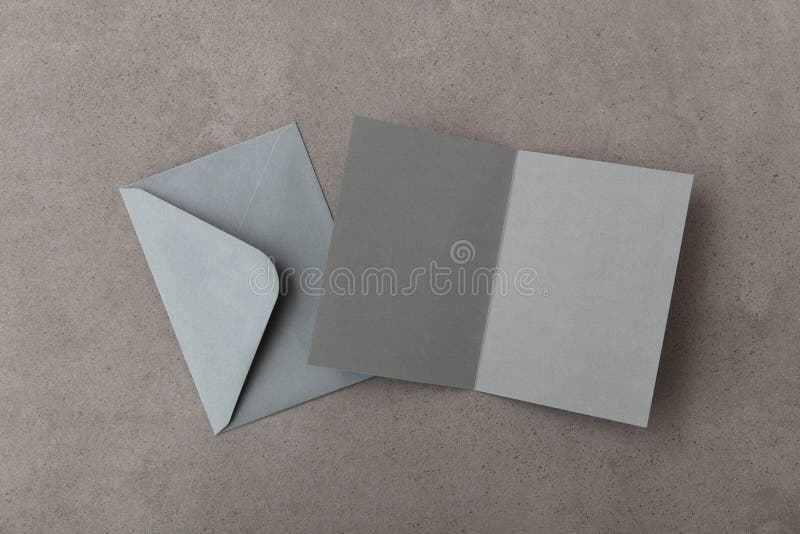 Blank Grey Card with Grey Paper Envelope Template Mock Up on a Concrete ...