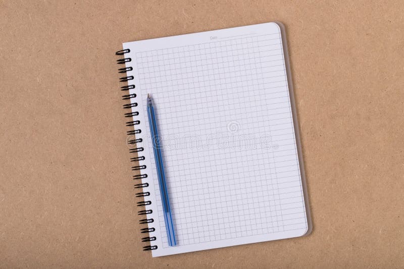 Blank Grid Notebook in Spiral on Board. Stock Image - Image of ...