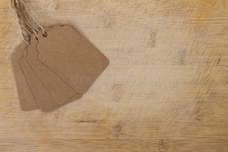 Blank Kraft Paper Tags with Twine on Wooden Background with Copy Space ...