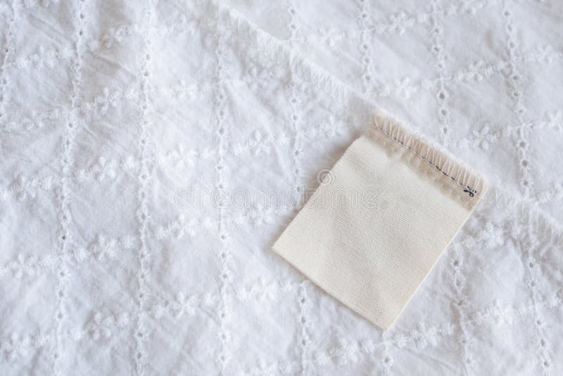 Blank Laundry Care Clothes Label on Fabric Texture Stock Image - Image ...