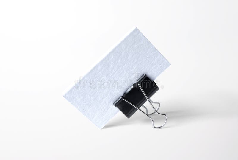 Blank Letterpress Business Cards Stack in the Clamp Isolated on White ...