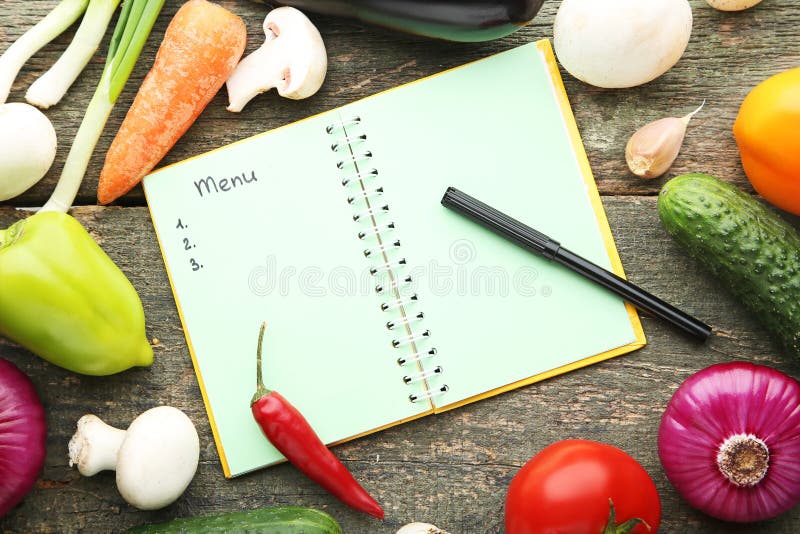 Menu book with vegetables stock photo. Image of frame - 103265618