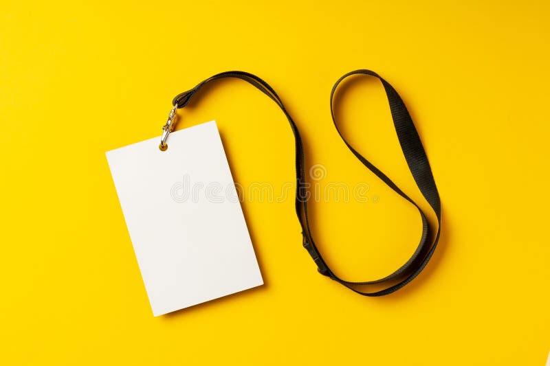 Blank Nametag on a String on Yellow Background Copy Space Stock Photo ...
