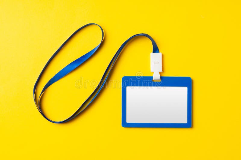 Blank Nametag on a String on Yellow Background Copy Space Stock Photo ...