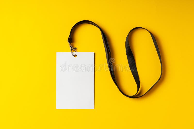 Blank Nametag on a String on Yellow Background Copy Space Stock Photo ...