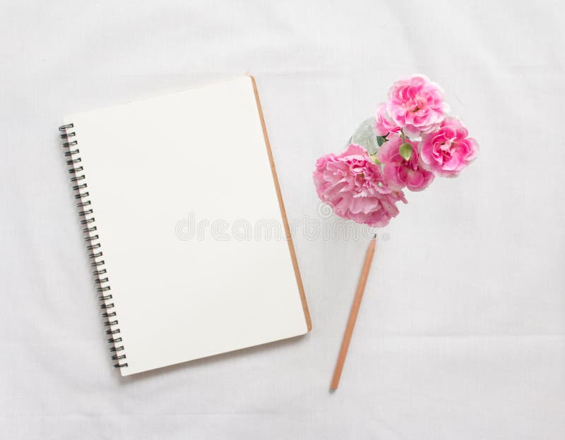 Blank notebook and flower stock image. Image of note - 76180191