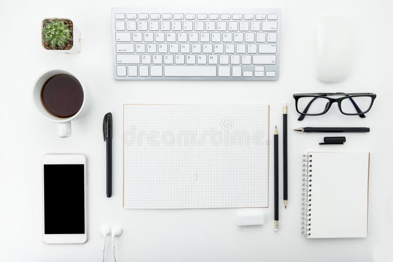 Blank Notebook is in the Middle of White Office Desk Table. Top View ...