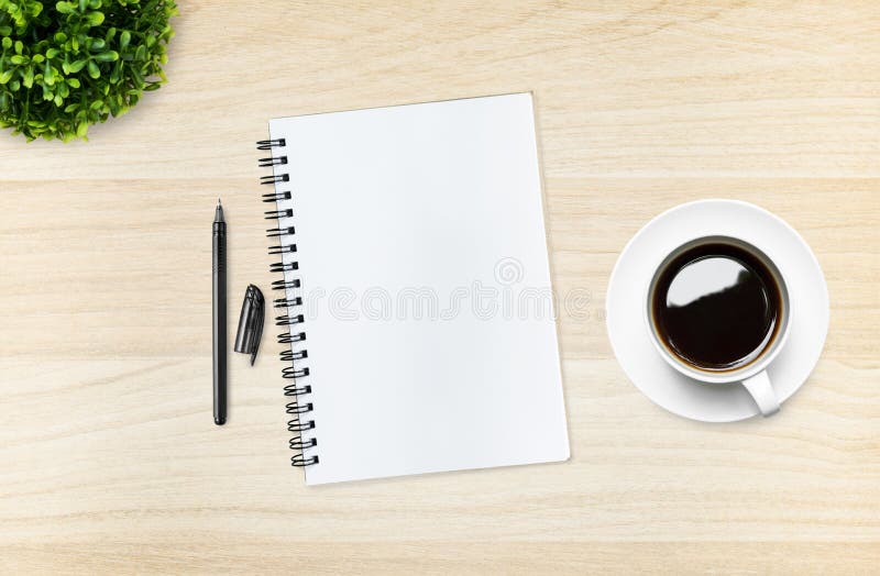 Blank Notebook Page in the Middle of Wood Office Desk Table with Coffee ...