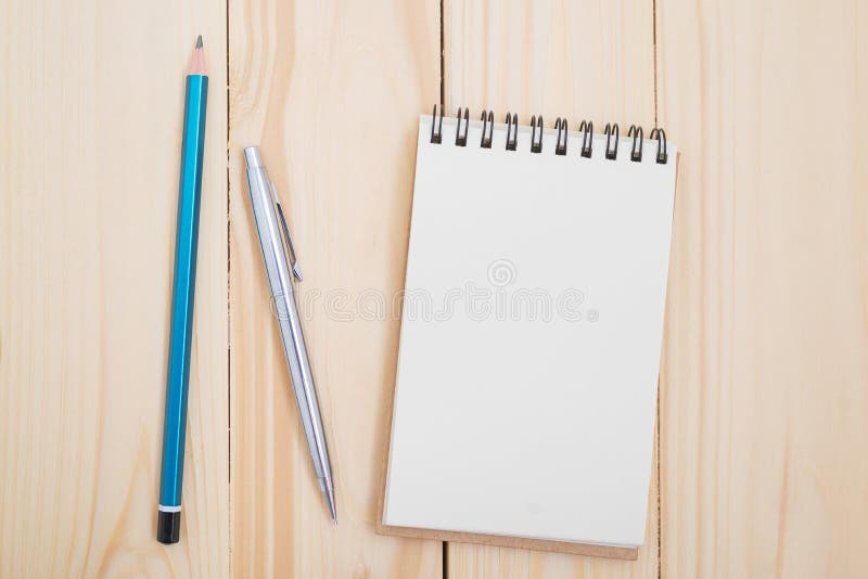Blank Notebook with Pen and Pencil on Wooden Table Stock Photo - Image ...