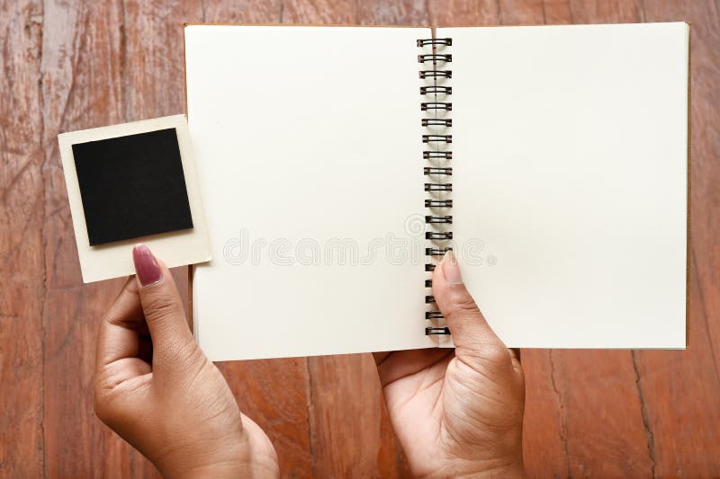 Blank Notebook Photo Frames Hand Stock Photos - Free & Royalty-Free ...