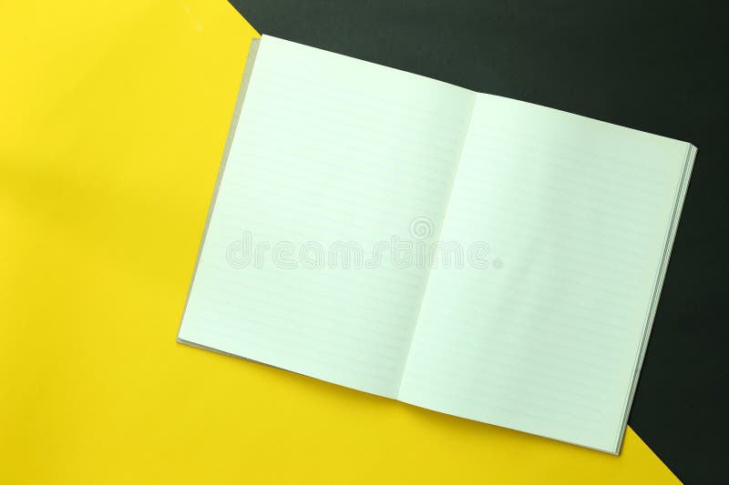 Blank Notebook Placed on Yellow and Black Paper Stock Image - Image of ...