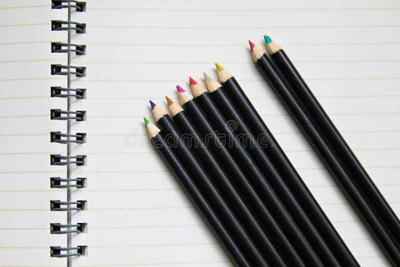 Blank Notebook with Row of Crayon Stock Photo - Image of communication ...