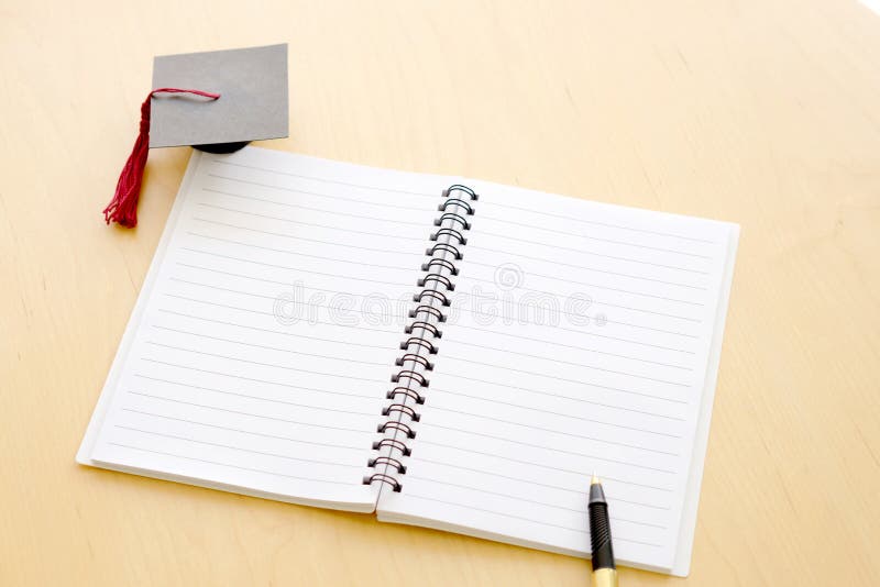 Blank Notebook on the Table and Graduation Cap Stock Image - Image of ...