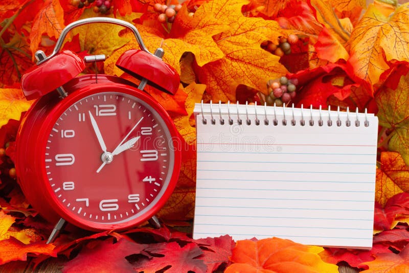 Blank Notepad with an Alarm Clock and Fall Leaves Stock Image - Image ...