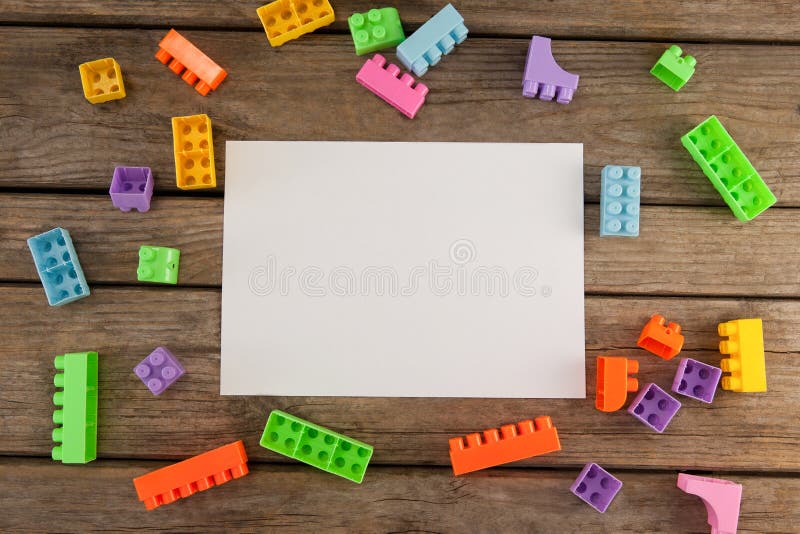 Blank Paper Amidst Toy Blocks on Table Stock Image - Image of page ...