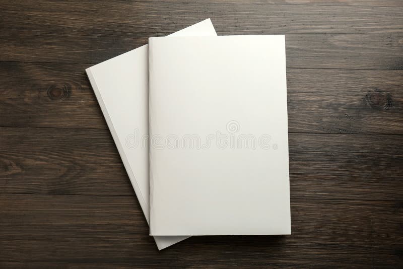 Blank Paper Brochures on Wooden Table, Top View. Mockup for Design ...