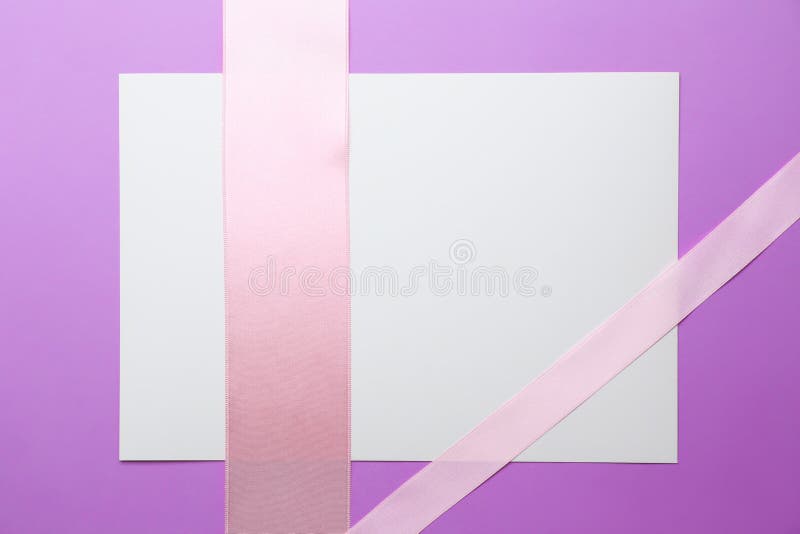 Blank Paper Card with Pink Ribbons on Color Background Stock Photo ...