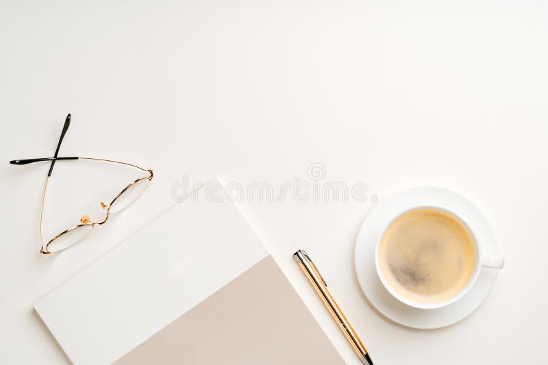 Blank Paper, Coffee Cup and Glasses on White Desk from Above Stock ...