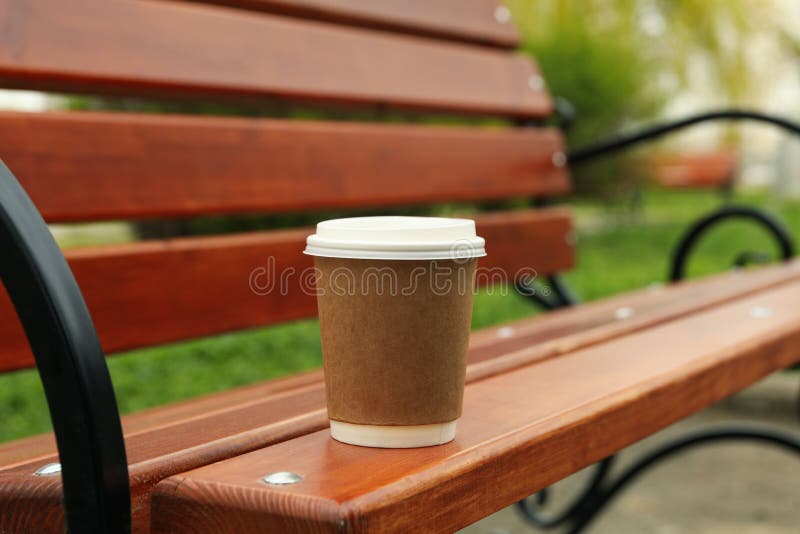 Blank Paper Cup on Bench in Park Stock Photo - Image of cafe, bench ...