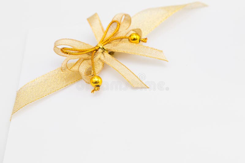 Blank Paper and Gold Ribbon Stock Photo - Image of coupon, icon: 57000666