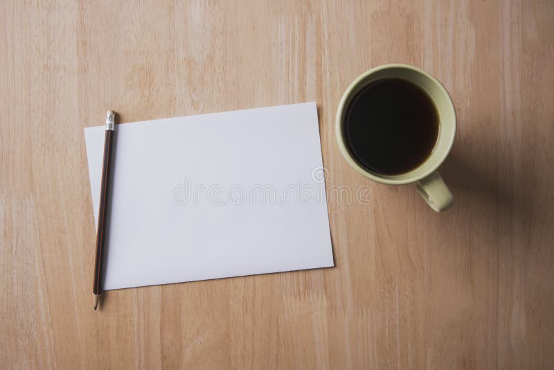 Blank Paper Note With Coffee And Pencil On Wooden Table Ready Stock ...