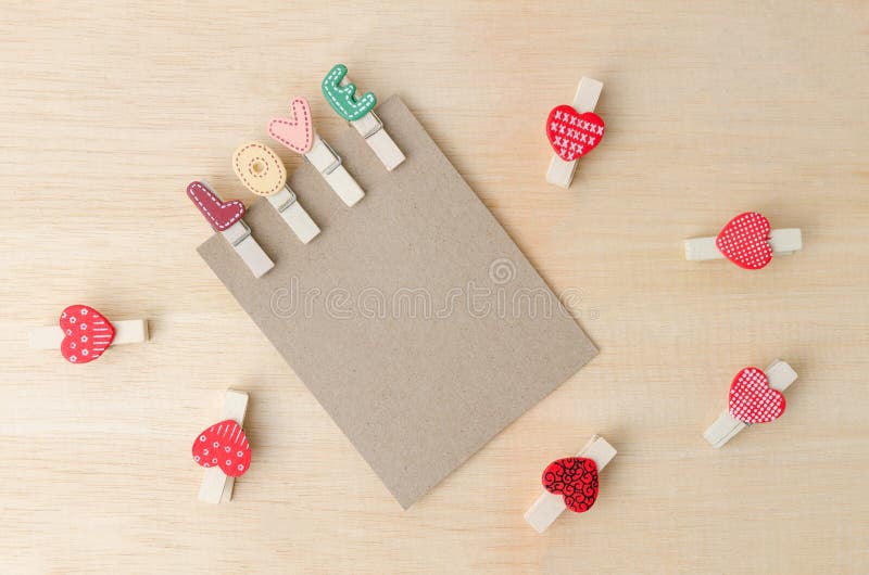 Blank Paper Note with Love Clips and Red Hearts on Wooden Background ...