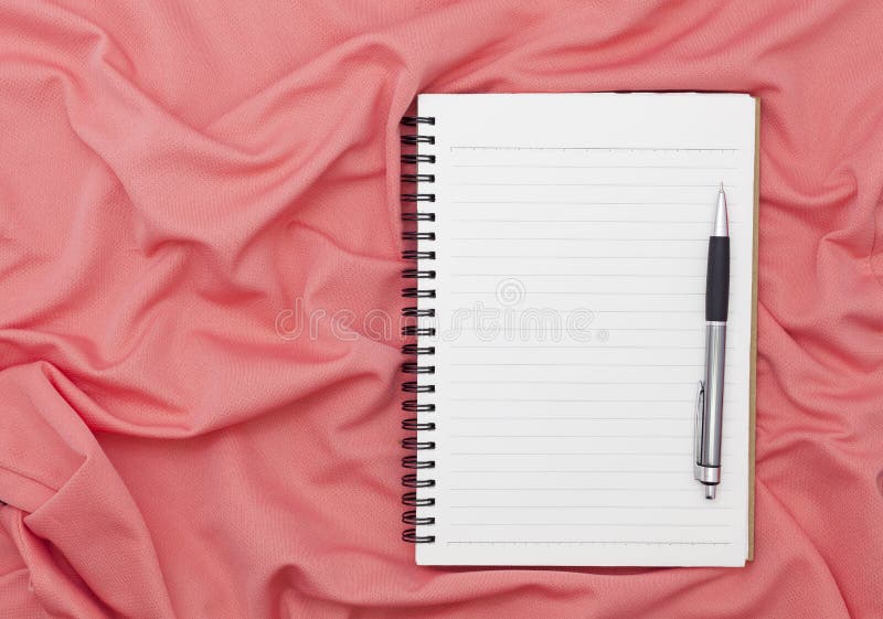 Blank Paper Notebook with Pen on Beautiful Pastel Silk Background ...