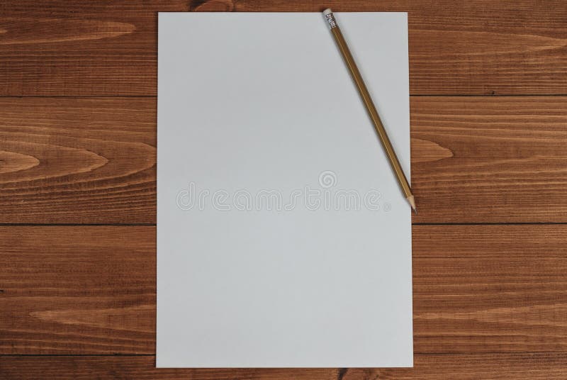 Blank Paper and Ordinary Pencil on a Wooden Table. View from Above ...