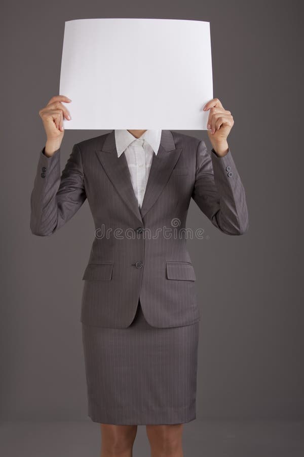 Businessman Holding a Paper with Question Marks in Front of His Stock ...