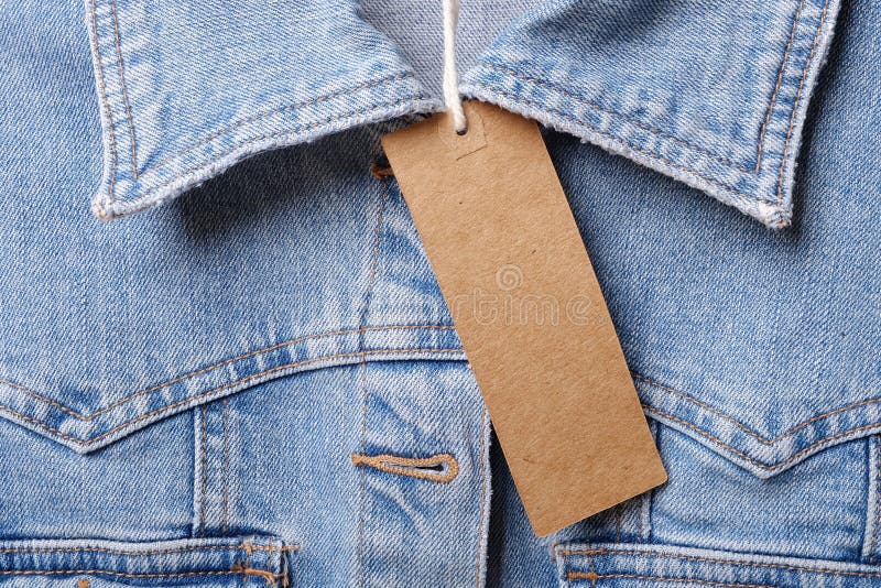 Blank paper tag on denim. stock image. Image of textured - 82324957