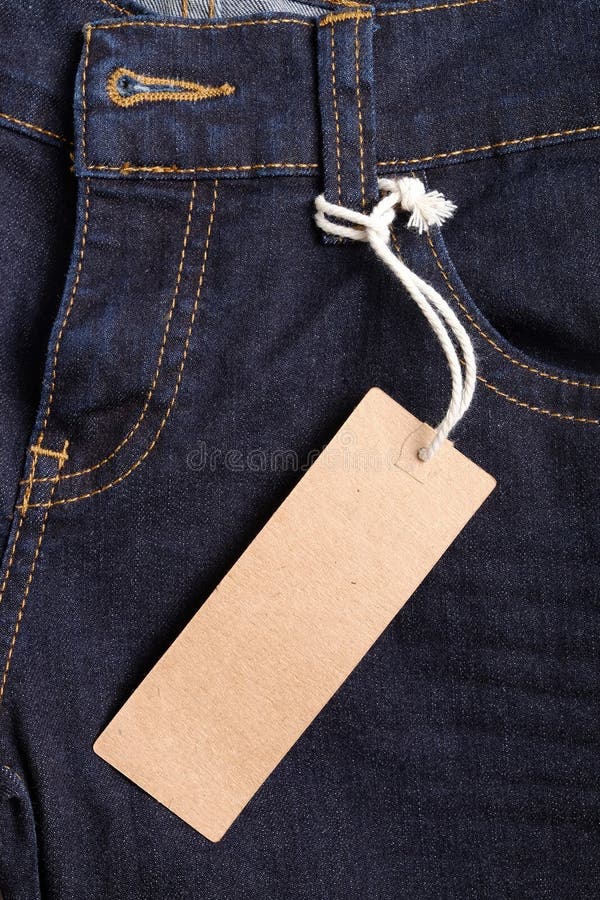 Blank paper tag on denim. stock photo. Image of paper - 82313398