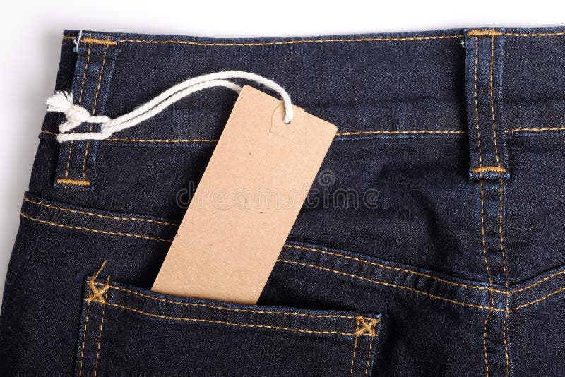 Blank paper tag on denim. stock photo. Image of denim - 82323868