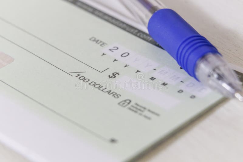 A Blank Personal Cheque with a Pen Stock Photo - Image of finance, debt ...